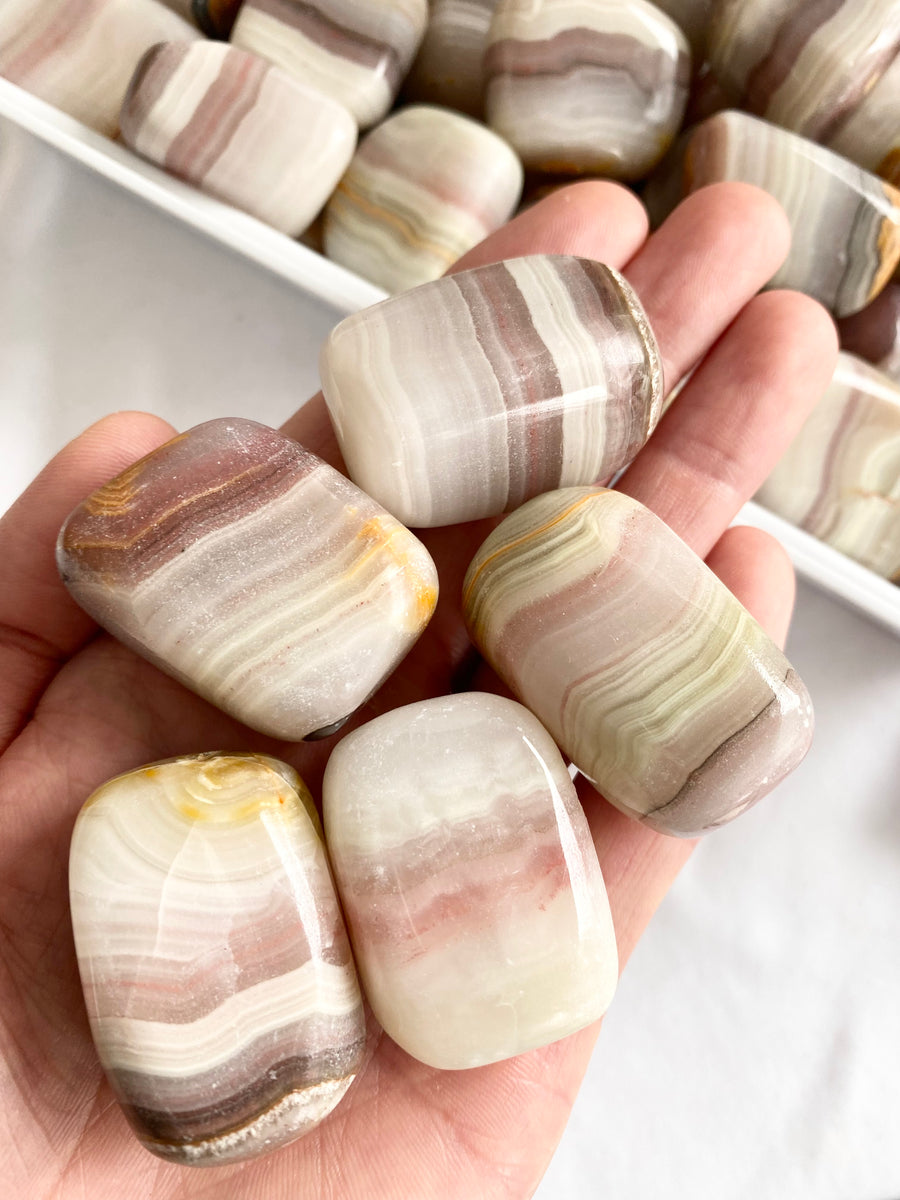 Pink Banded Calcite Tumbled – GURU CRYSTALS